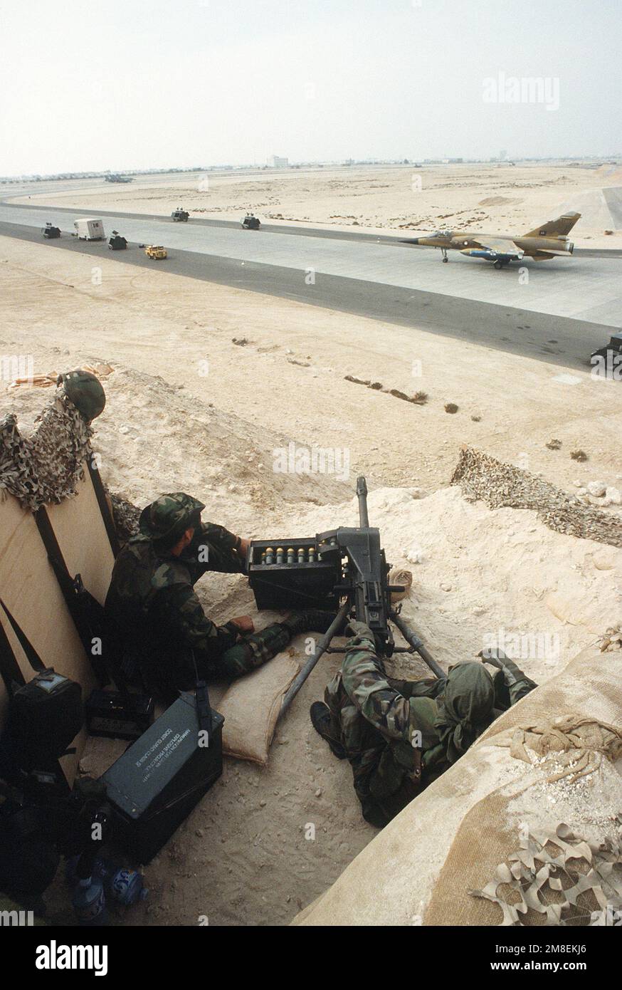 SGT. Victor Haskins, 401st Tactical Fighter Wing, mans a Mark 19 40mm ...