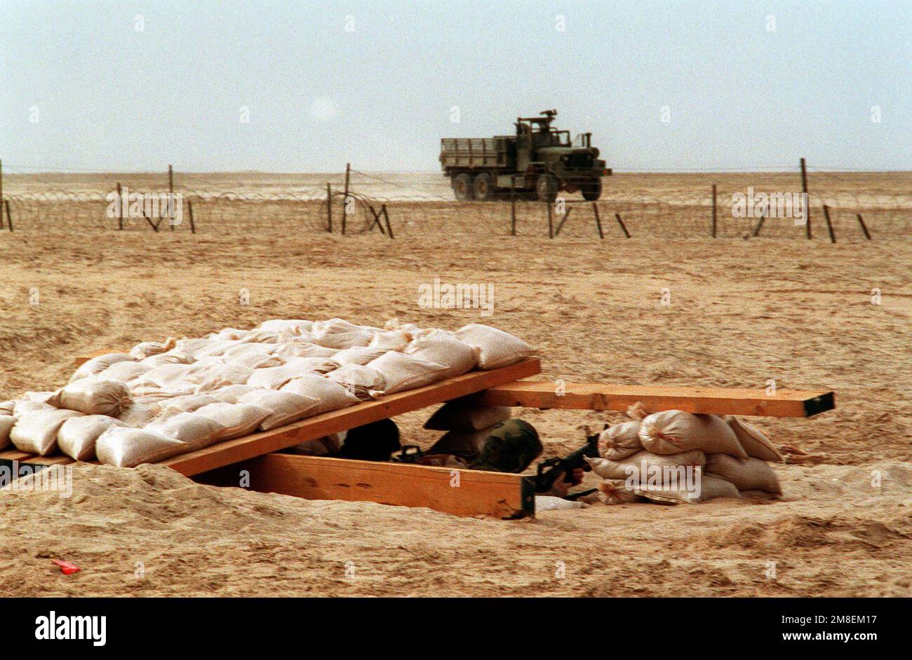 Seabees from Naval Mobile Construction Battalion 5 (NMCB-5) man a ...