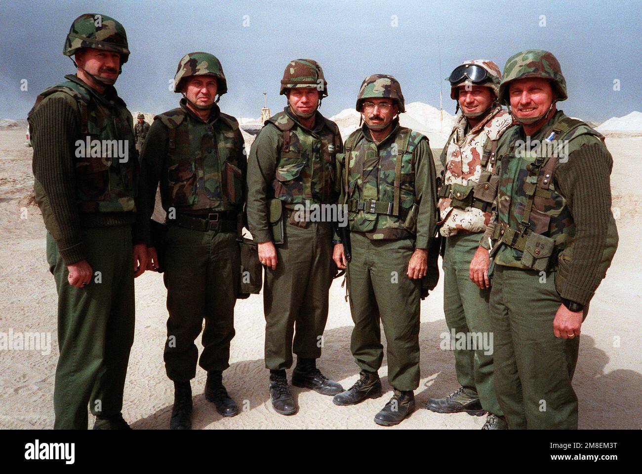 Officers of Naval Mobile Construction Battalion 5 (NMCB-5) gather for a ...