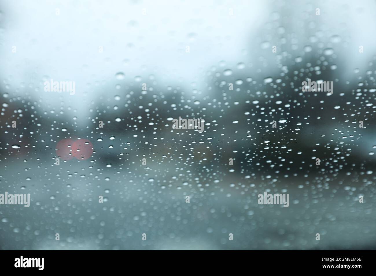 raindrop raining on car window droplets gloomy day Stock Photo - Alamy