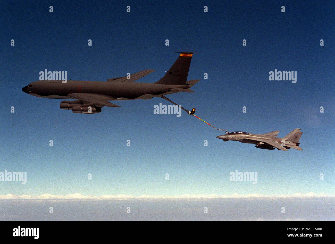 A Fighter Squadron 41 (VF-41) F-14A Tomcat aircraft is refueled by a KC ...