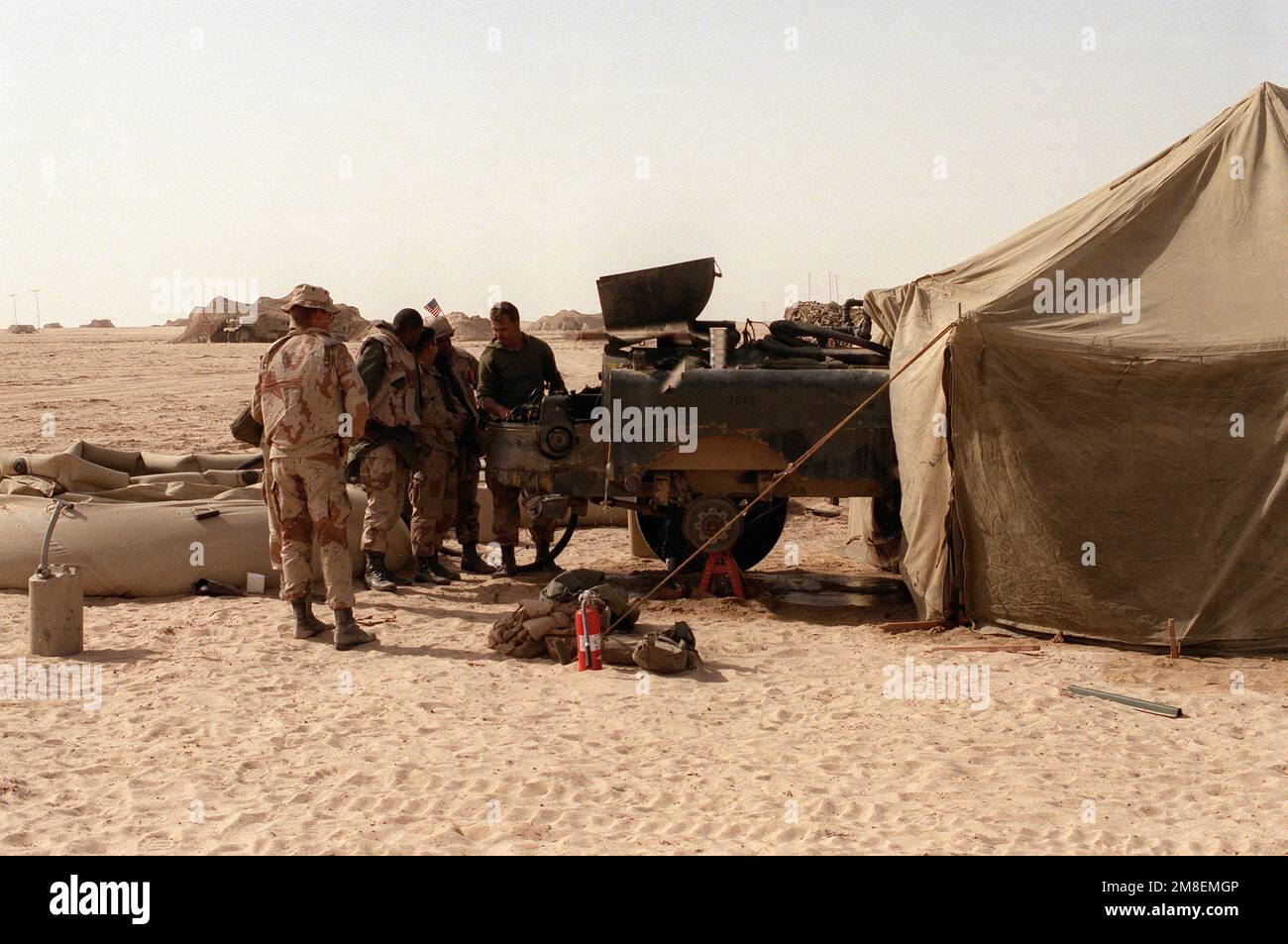 Supply personnel from the 2nd Marine Division set up a trailer-mounted ...