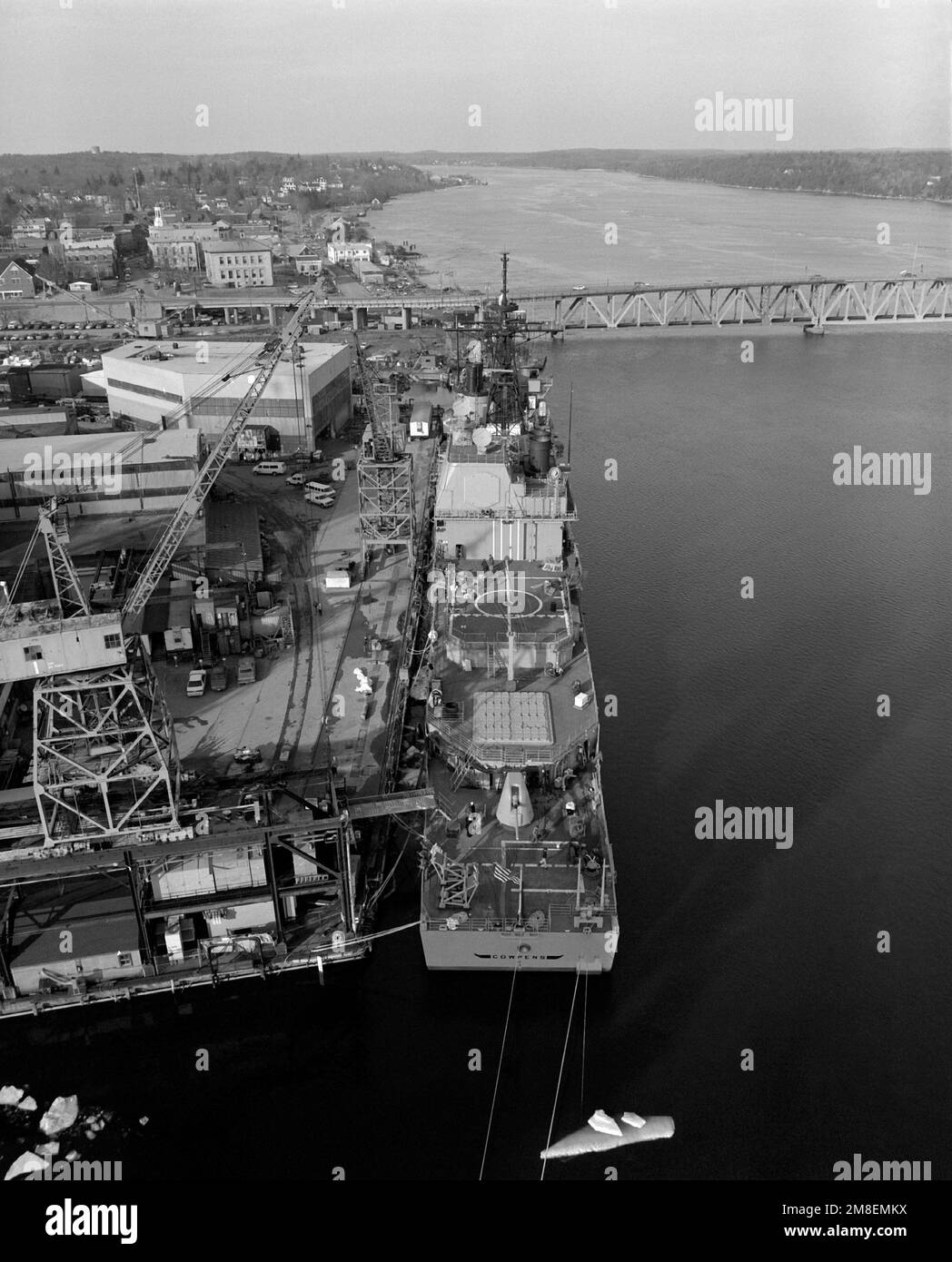A stern view of the guided missile cruiser COWPENS (CG-63) moored at ...