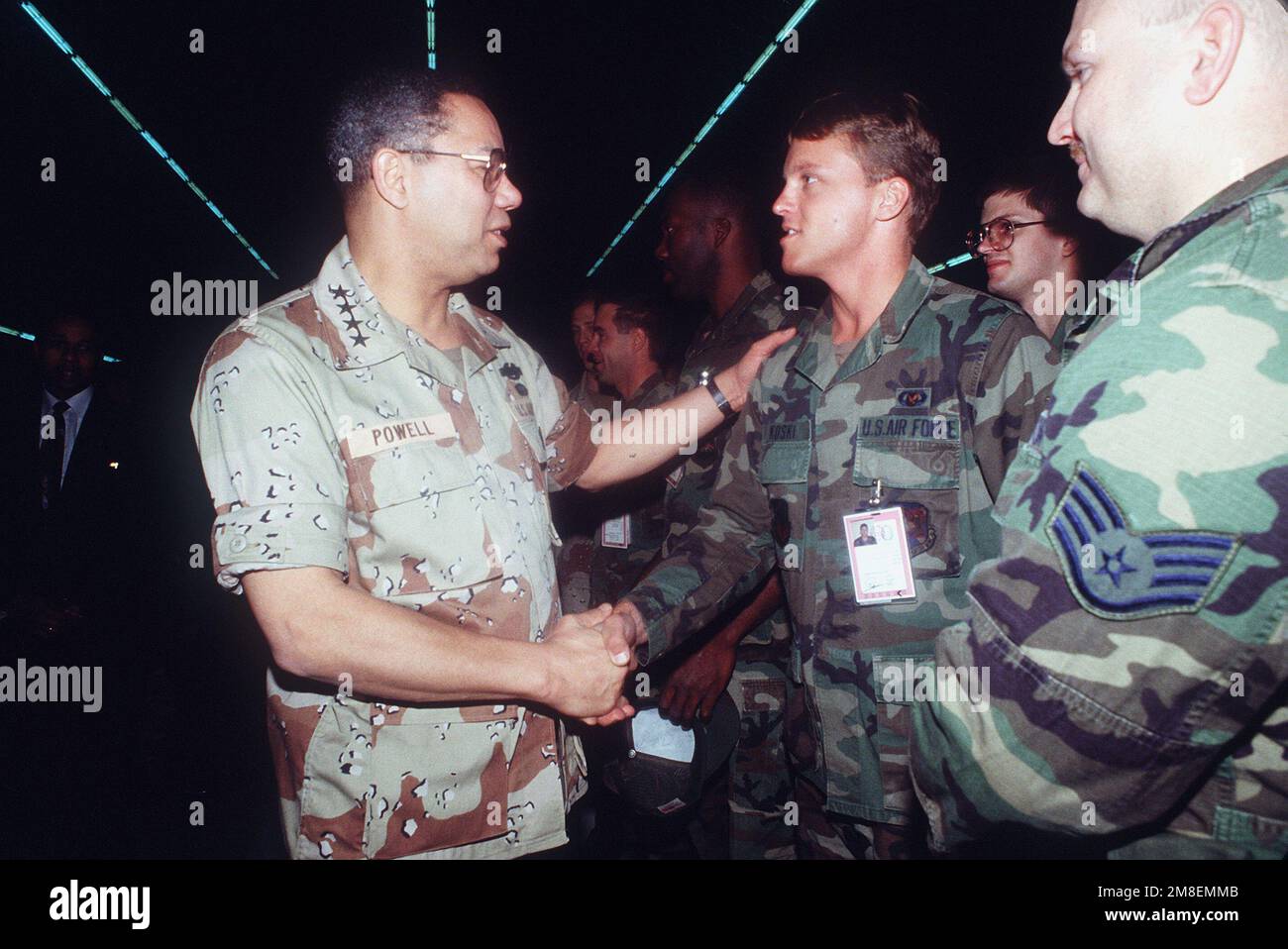 GEN. Colin Powell, chairman, Joint Chiefs of STAFF, shakes hands with a ...