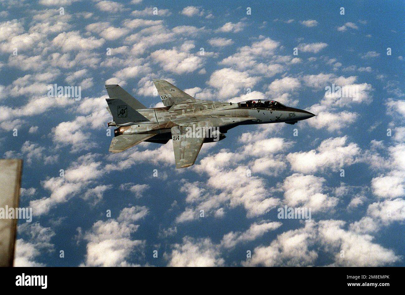 A Fighter Squadron 41 (VF-41) F-14A Tomcat aircraft flies a combat air ...
