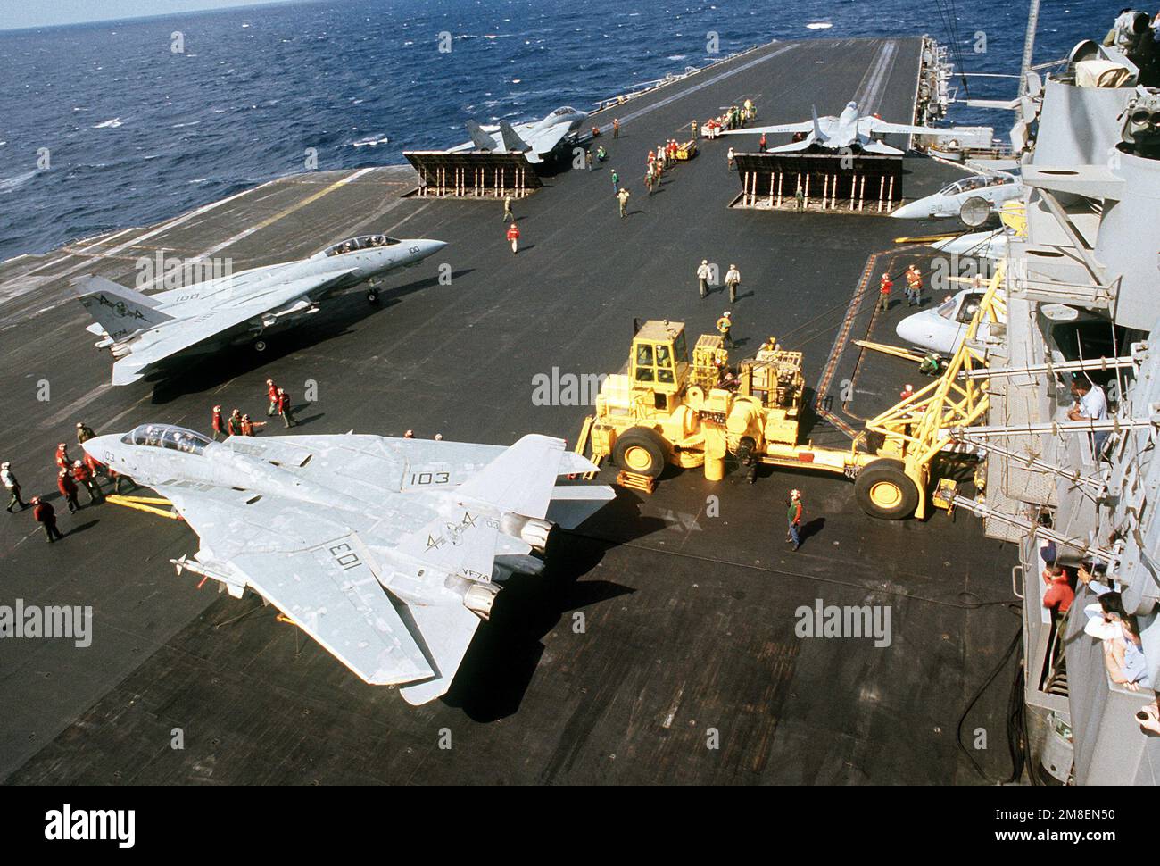 Fighter Squadron 74 (VF-74) F-14A Tomcat aircraft taxi on the flight ...