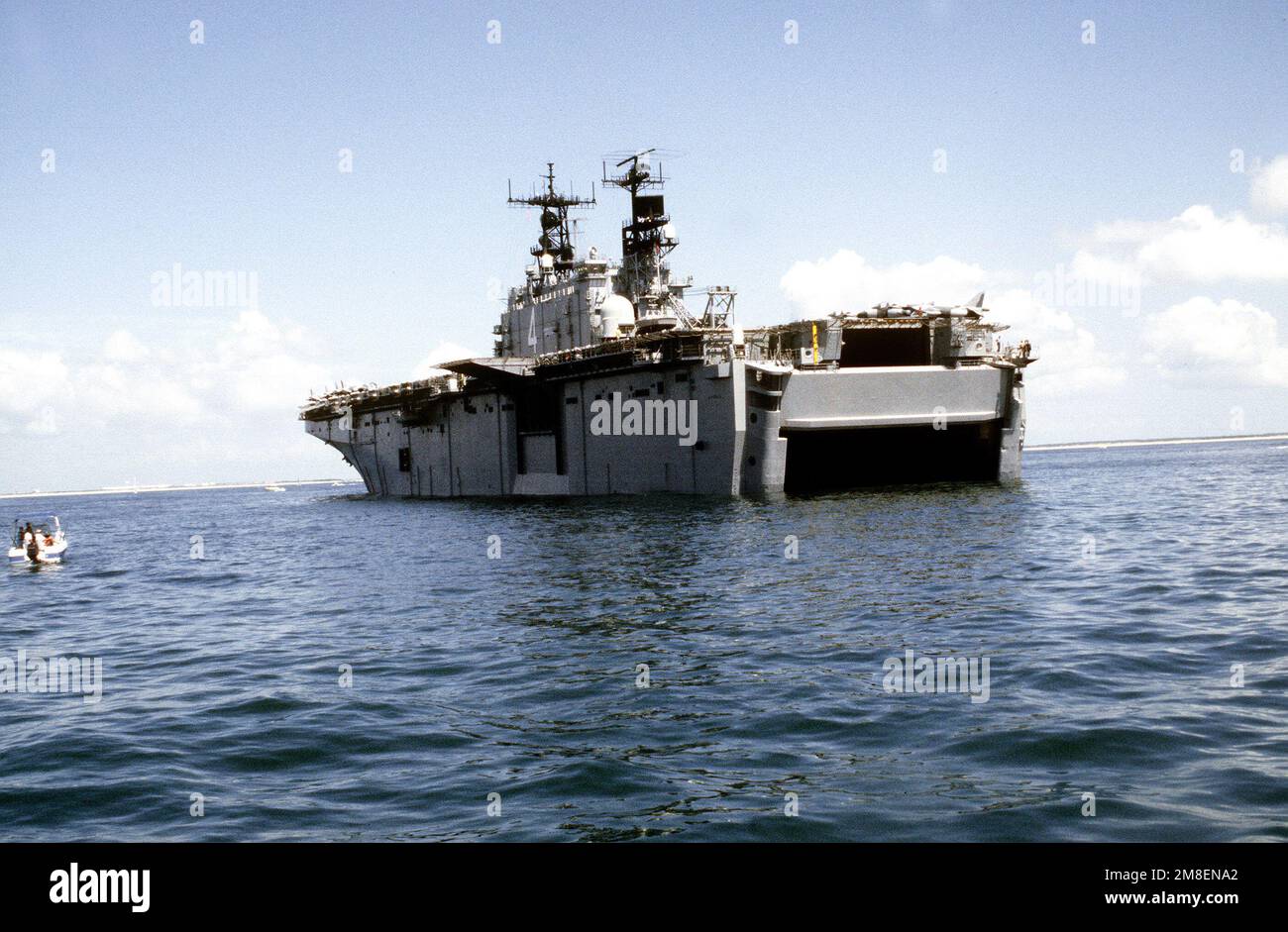 The amphibious assault ship USS NASSAU (LHA-4) lies at anchor with its ...