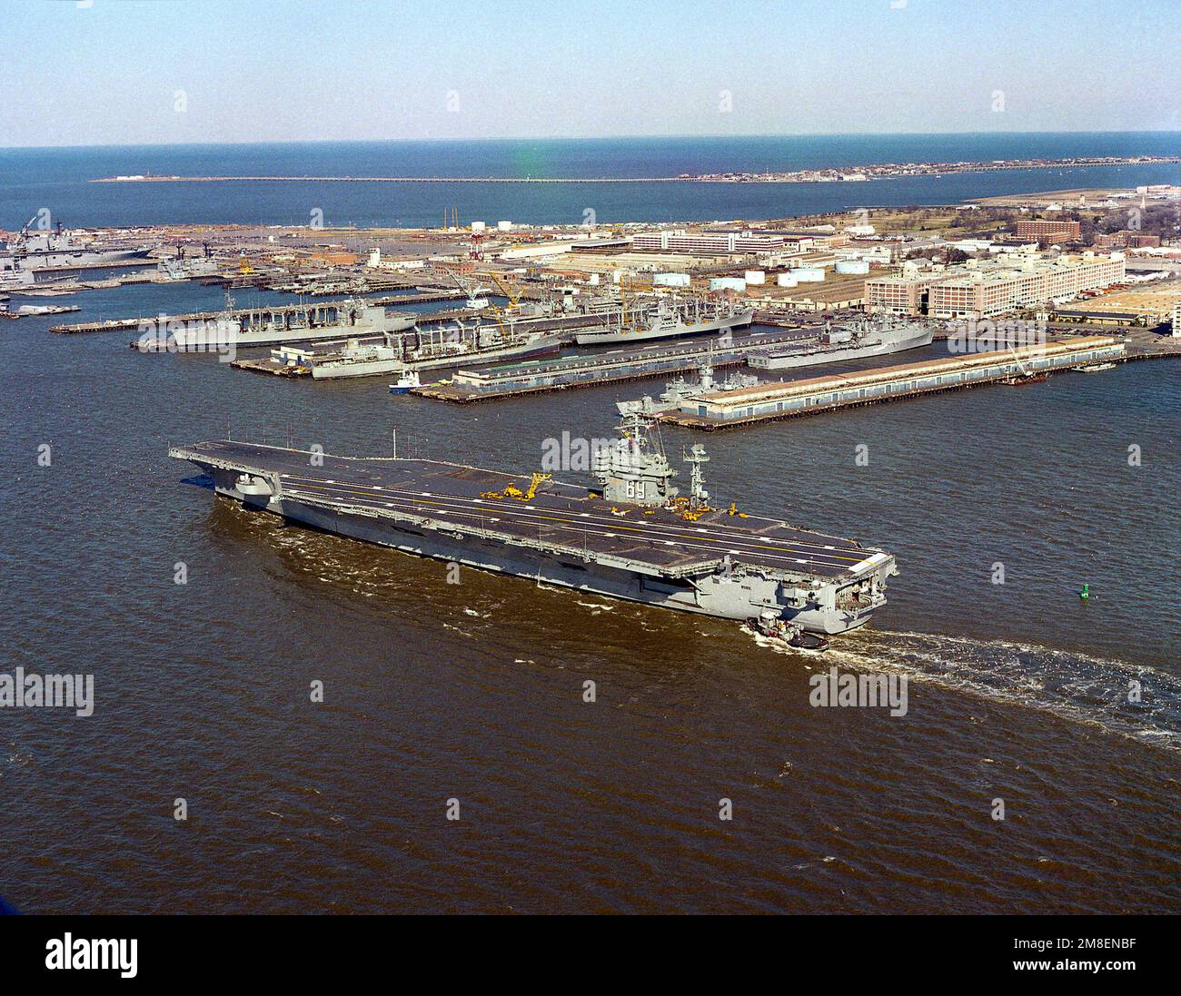 A port quarter view of the nuclear-powered aircraft carrier USS DWIGHT ...