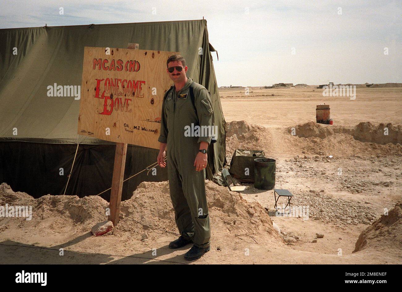 CAPT. R.J. Worsley poses for a photograph in front of the airfield's ...
