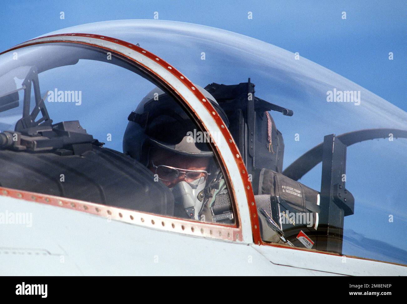 COL. Rick N. Parsons, commander, 33rd Tactical Fighter Wing, checks his ...