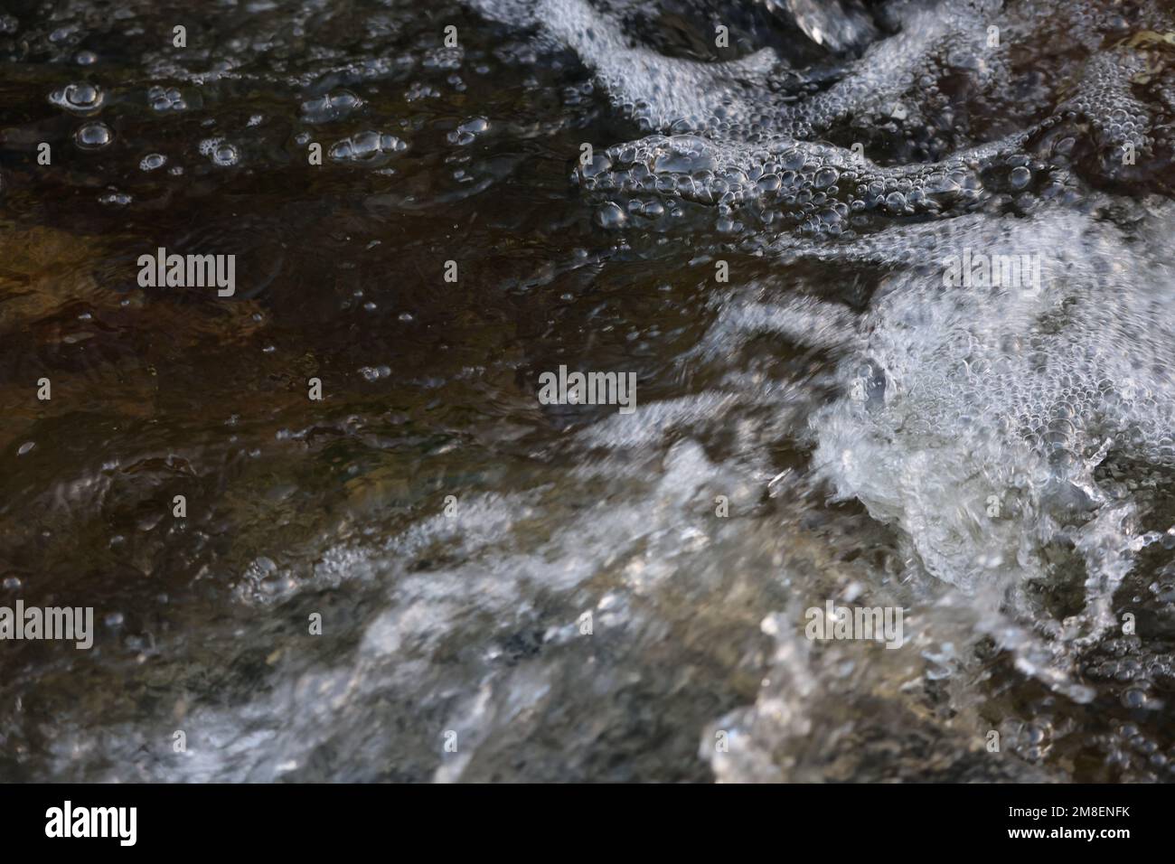 Up close of water stream Stock Photo - Alamy
