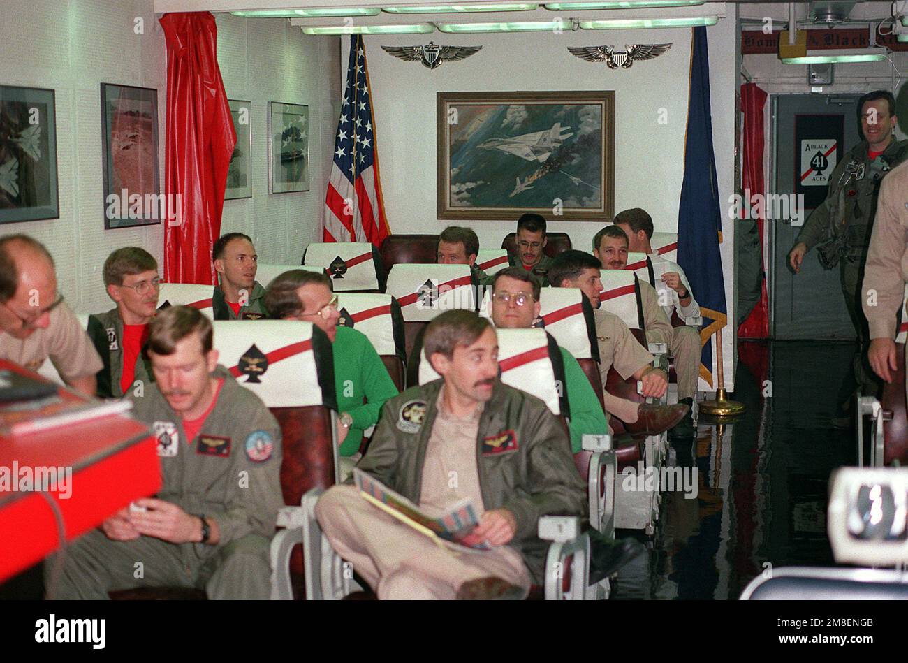 The officers of Fighter Squadron 41 (VF-41) gather for a briefing in ...