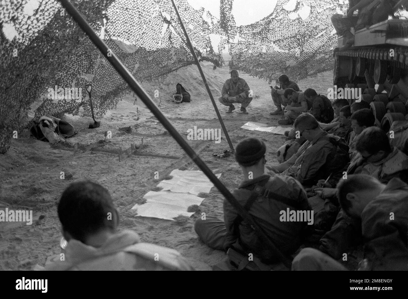 Members of the 3rd Tank Battalion, 1ST Marine Division, review plans ...
