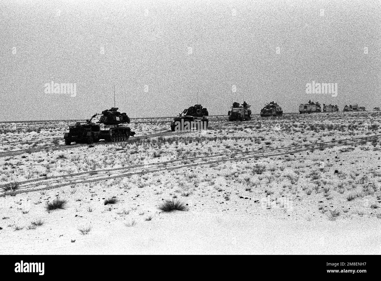 A column of vehicles assigned to Task Force Ripper, including M-60A1 ...