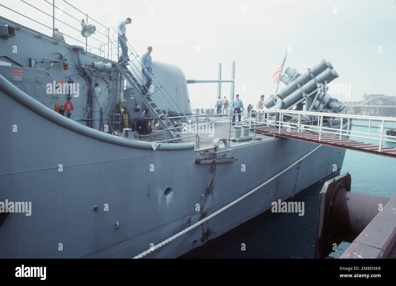 The Aegis-guided missile cruiser USS PRINCETON (CG-59) is moored to a ...