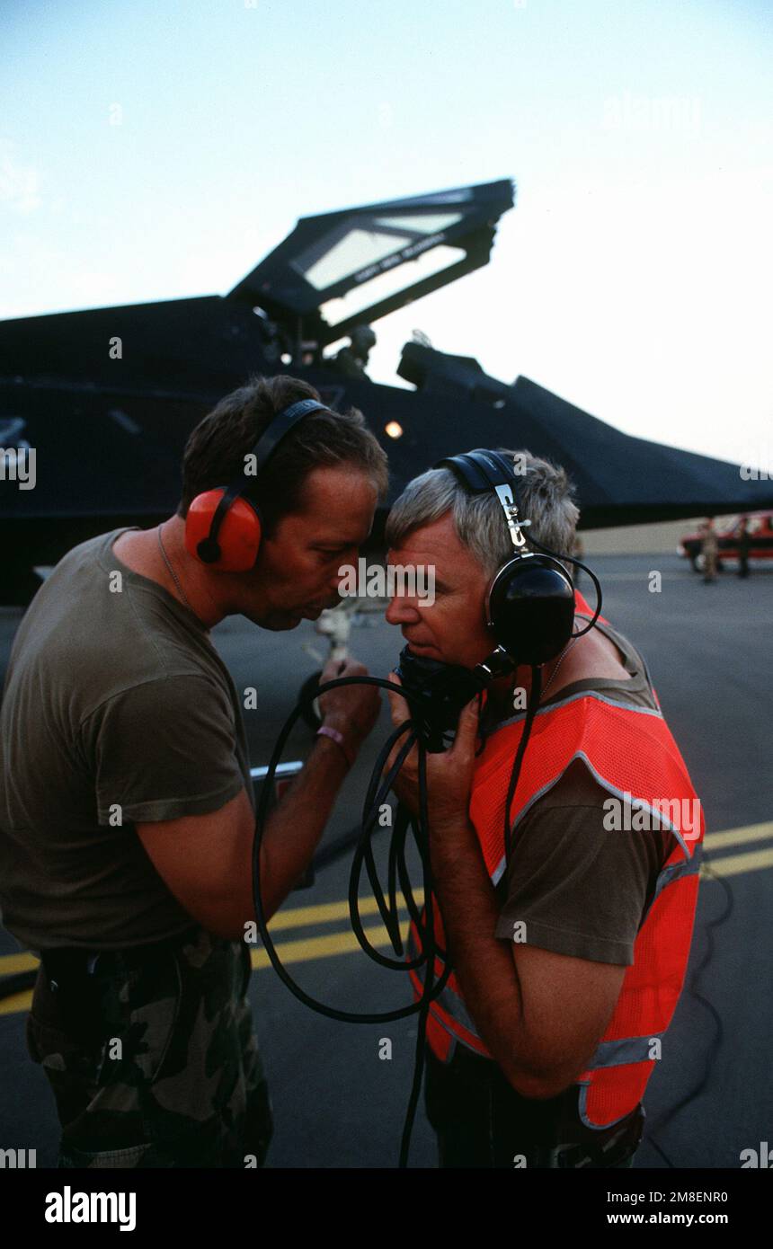 Ground crew members of the 37th Tactical Air Wing converse prior to ...
