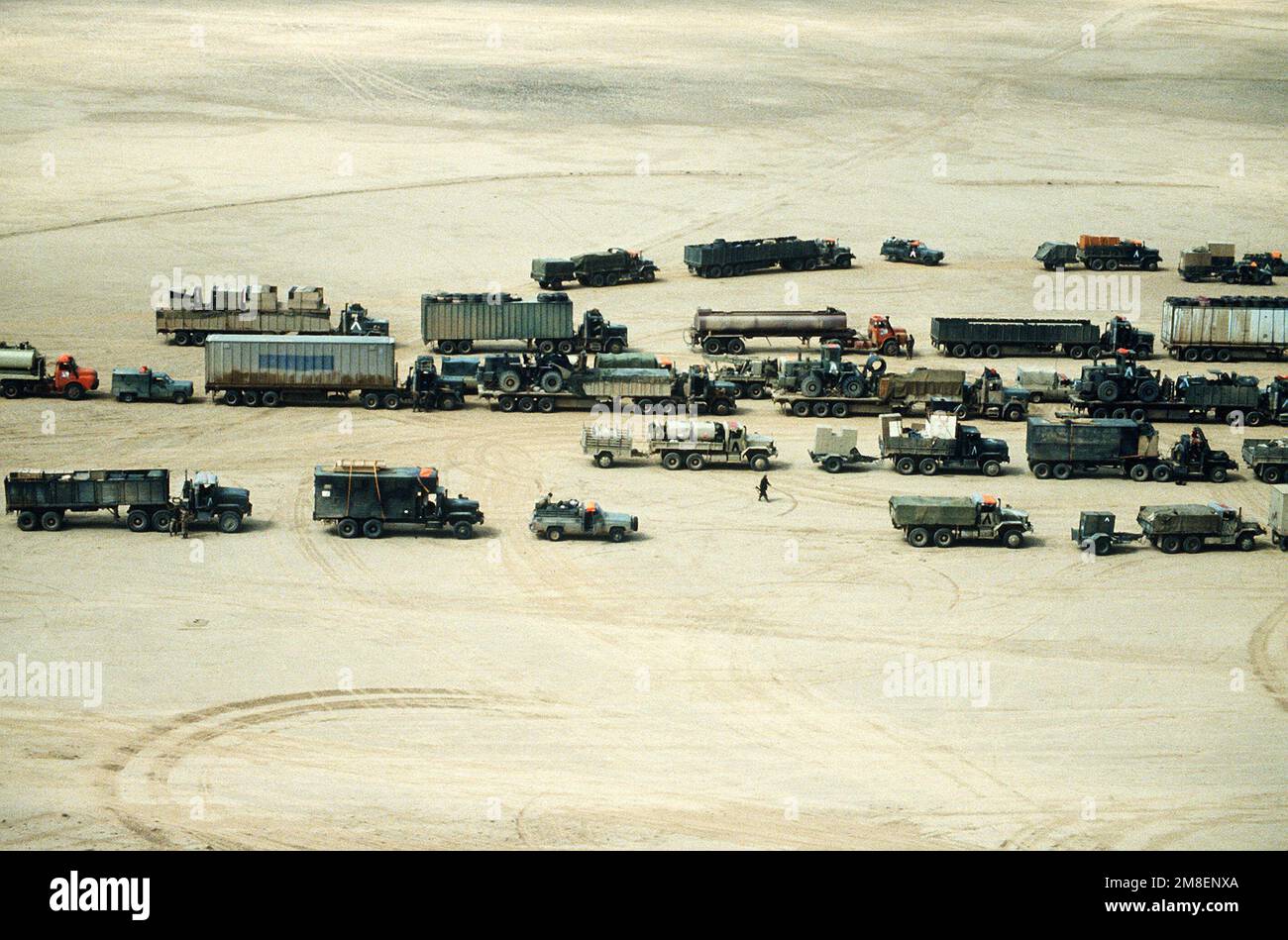 A 24th Infantry Division convoy approaches the Iraqi border during ...
