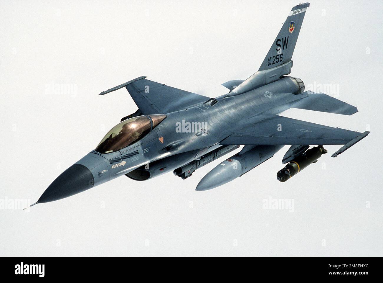 An air-to-air overhead view of a 363rd Tactical Fighter Wing F-16C ...