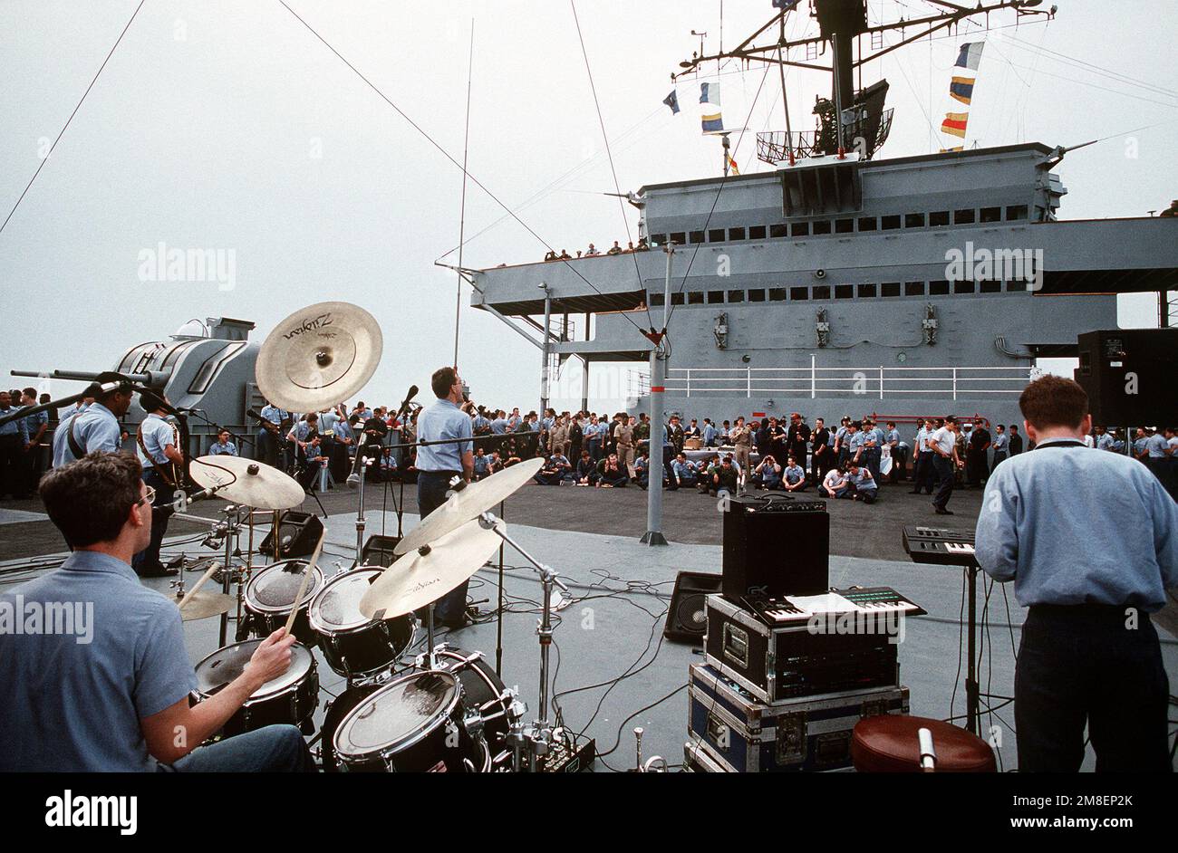 A band entertains the crew of the amphibious command ship USS BLUE RIGE ...