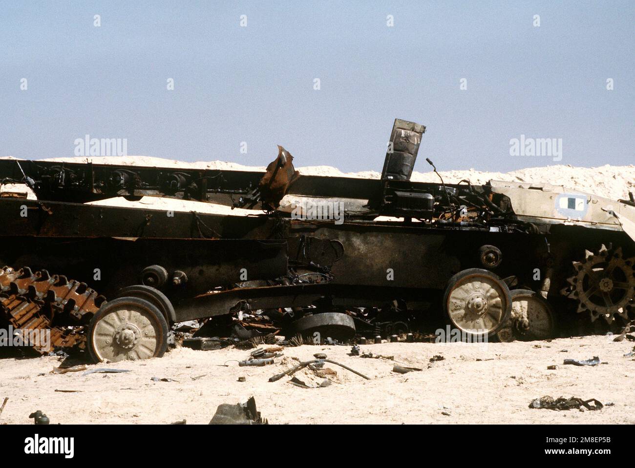 The remains of an Iraqi BMP-1 mechanized infantry combat vehicle lie in ...