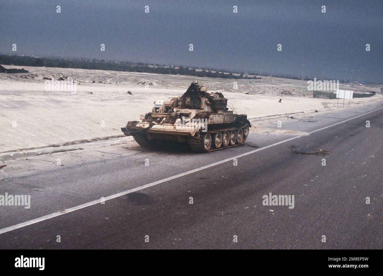 A Chinese-made Type 653 armored recovery vehicle abandoned by Iraqi ...