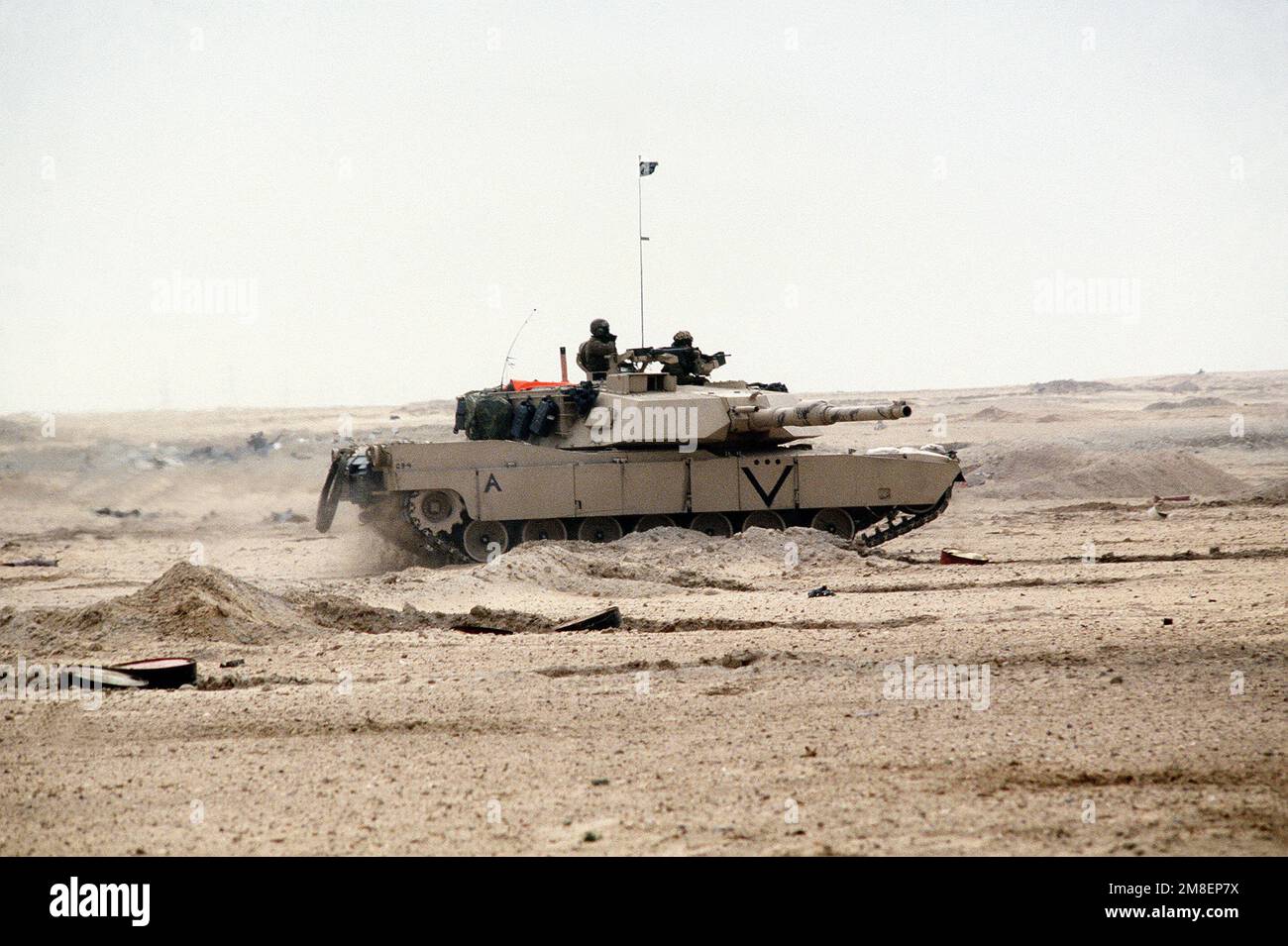 A Marine Corps M-1A1 Abrams main battle tank moves across the desert ...