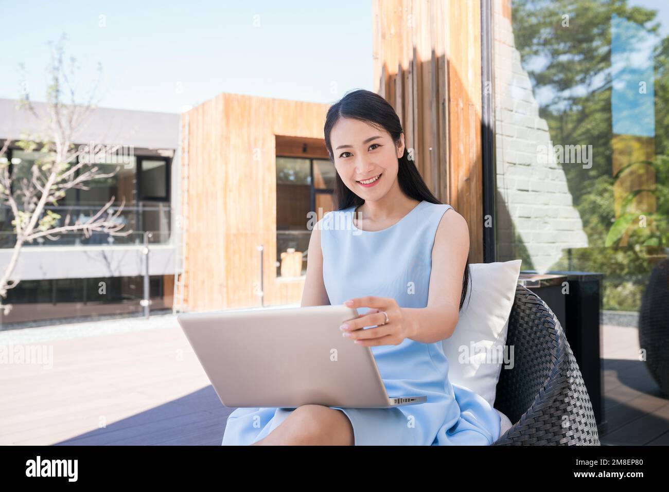 A young woman use the computer Stock Photo - Alamy