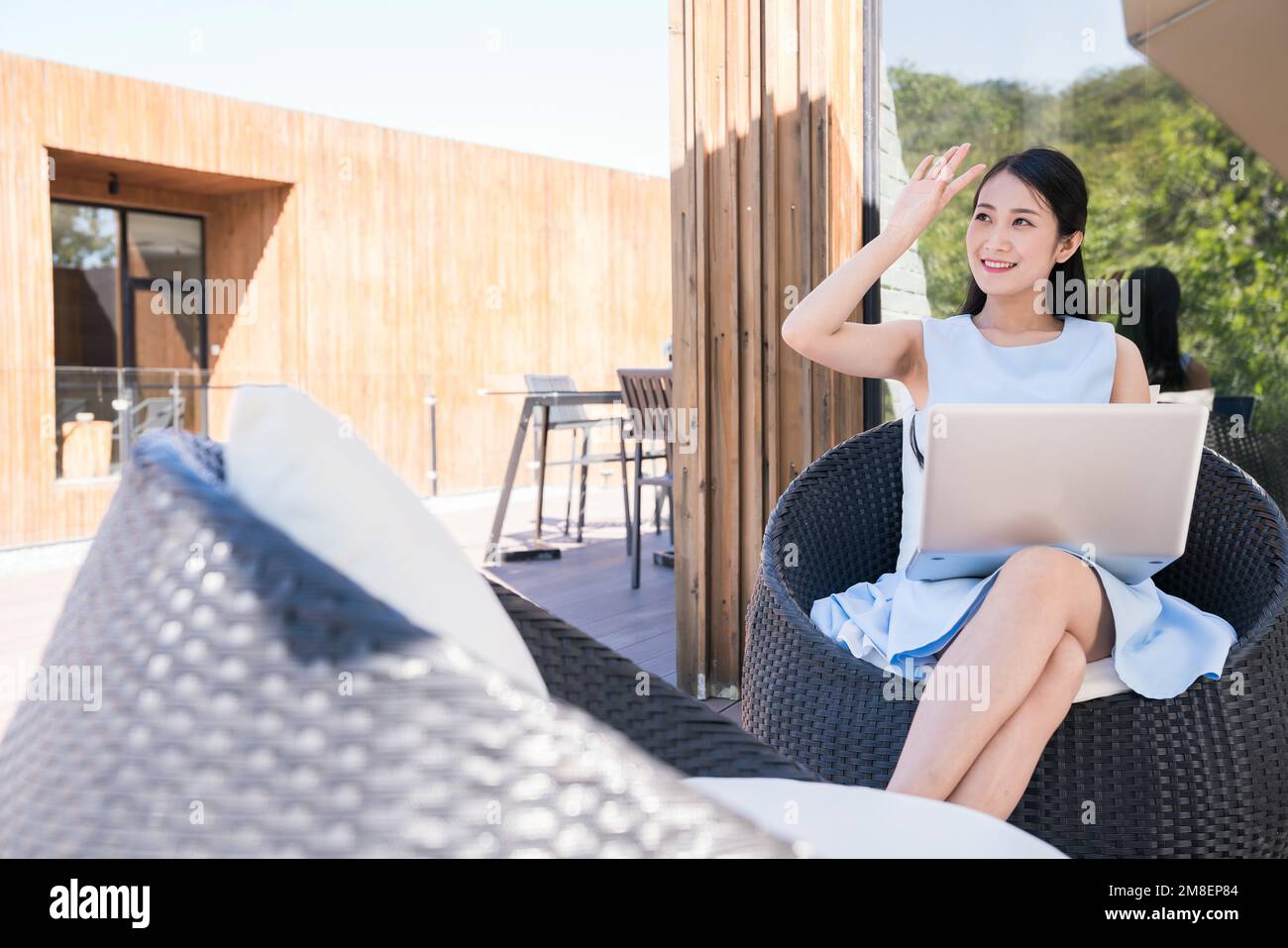 A young woman use the computer Stock Photo - Alamy