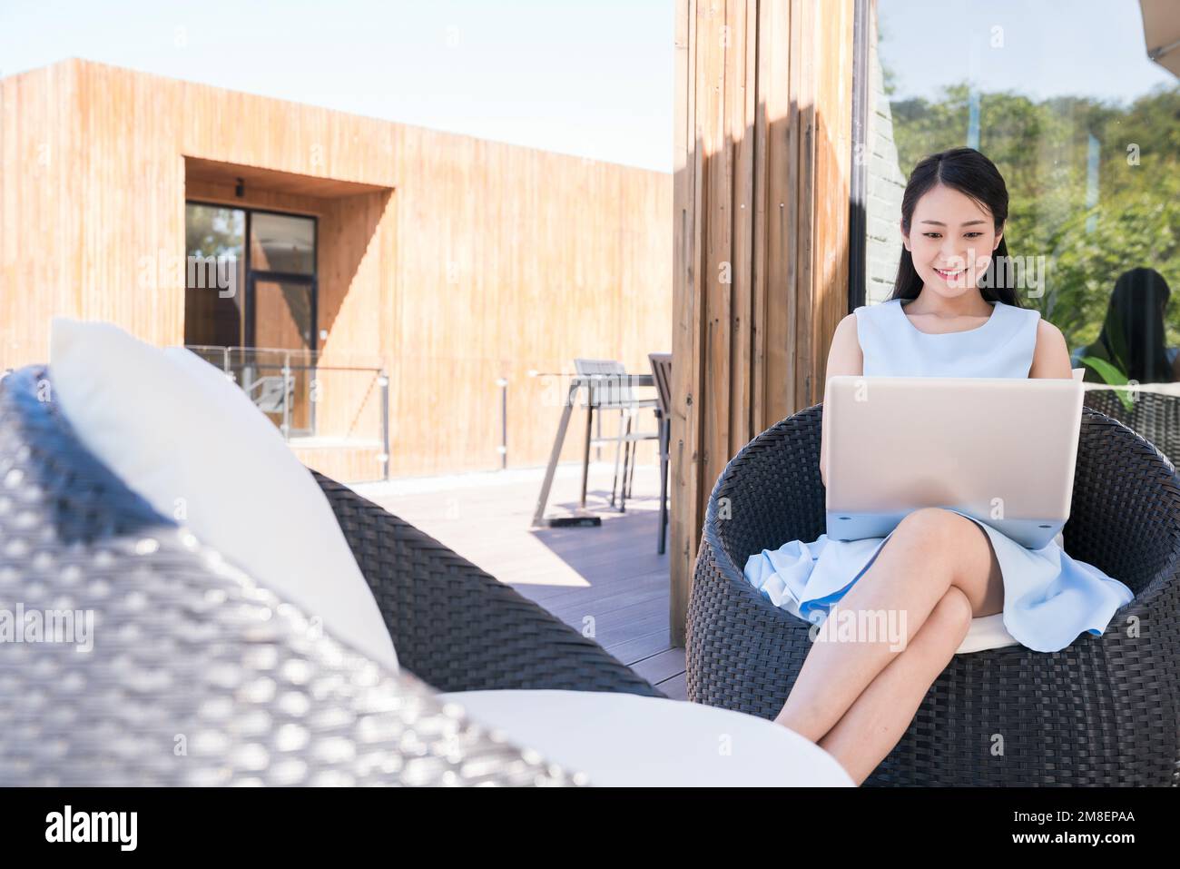 A young woman use the computer Stock Photo - Alamy