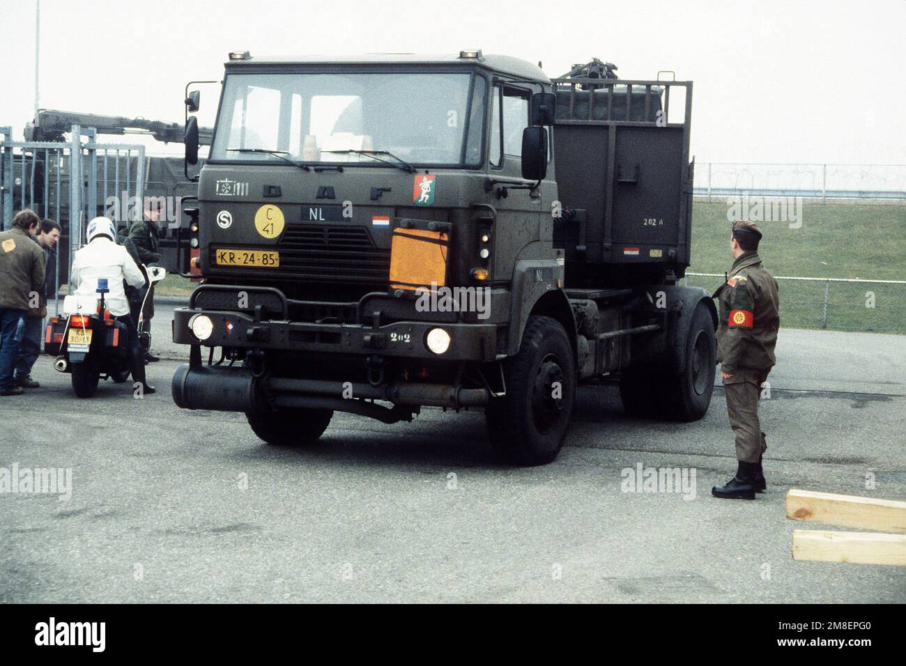 Members of the Dutch army's 812th Transportation Group position a DAF ...