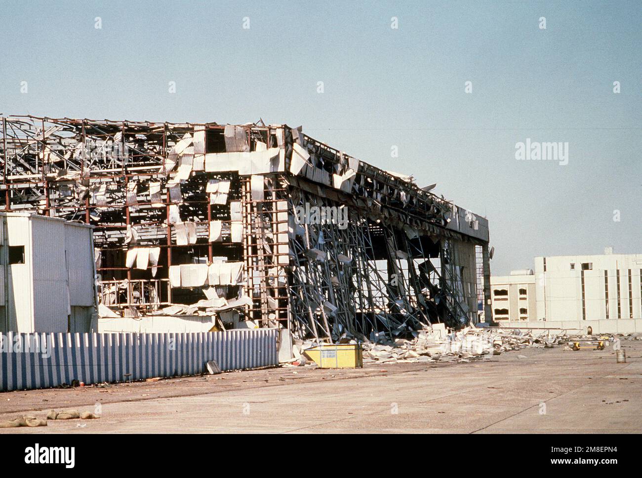 A destroyed hangar at Kuwait International Airport after the retreat of ...