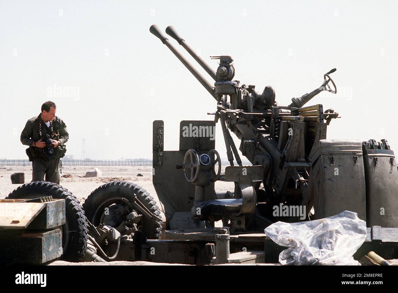STAFF SGT. Lee Corkran, a combat photojournalist, photographs an Iraqi ...