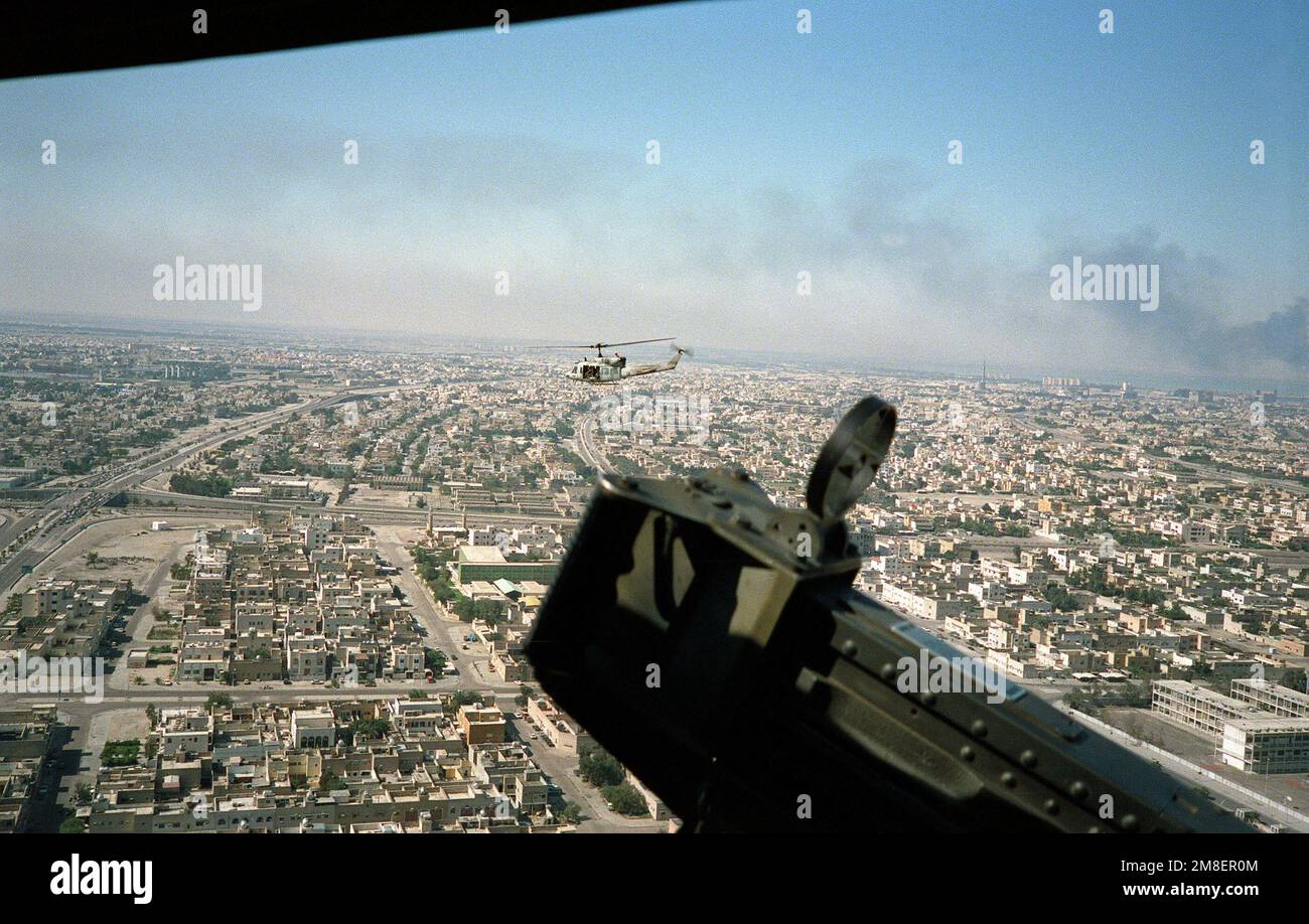 An air-to-air view of a Marine Light Helicopter Squadron 767 (HML-767 ...