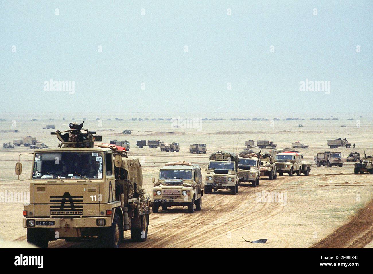 A Bedford Tm 4x4 16,000-pound truck heads a convoy of Land-Rover One ...
