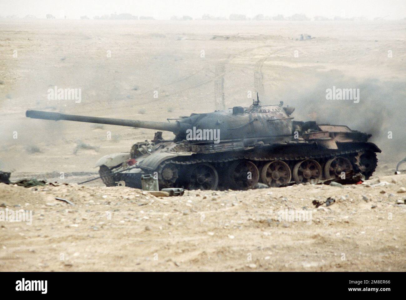 An Iraqi T-55 main battle tank damaged during Operation Desert Storm ...