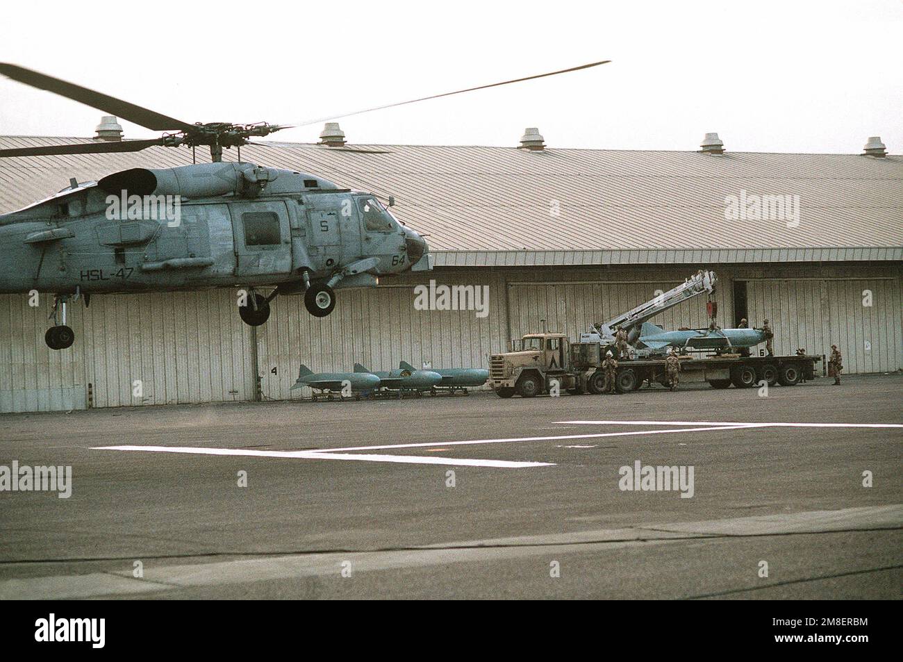 An SH-60B Sea Hawk helicopter from Helicopter Light Anti-submarine ...