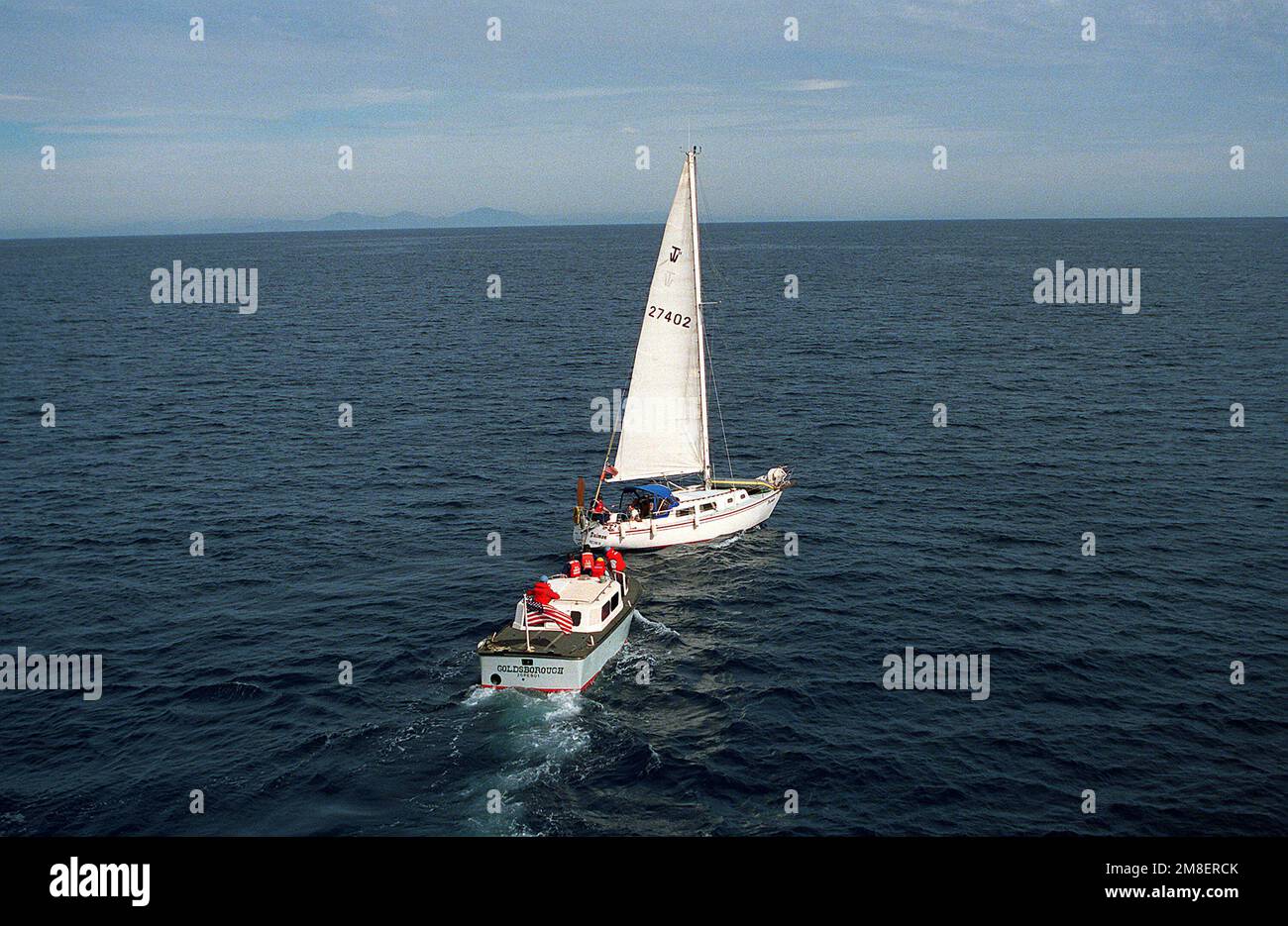 Sailors aboard a 26-foot personnel boat from the guided missile ...