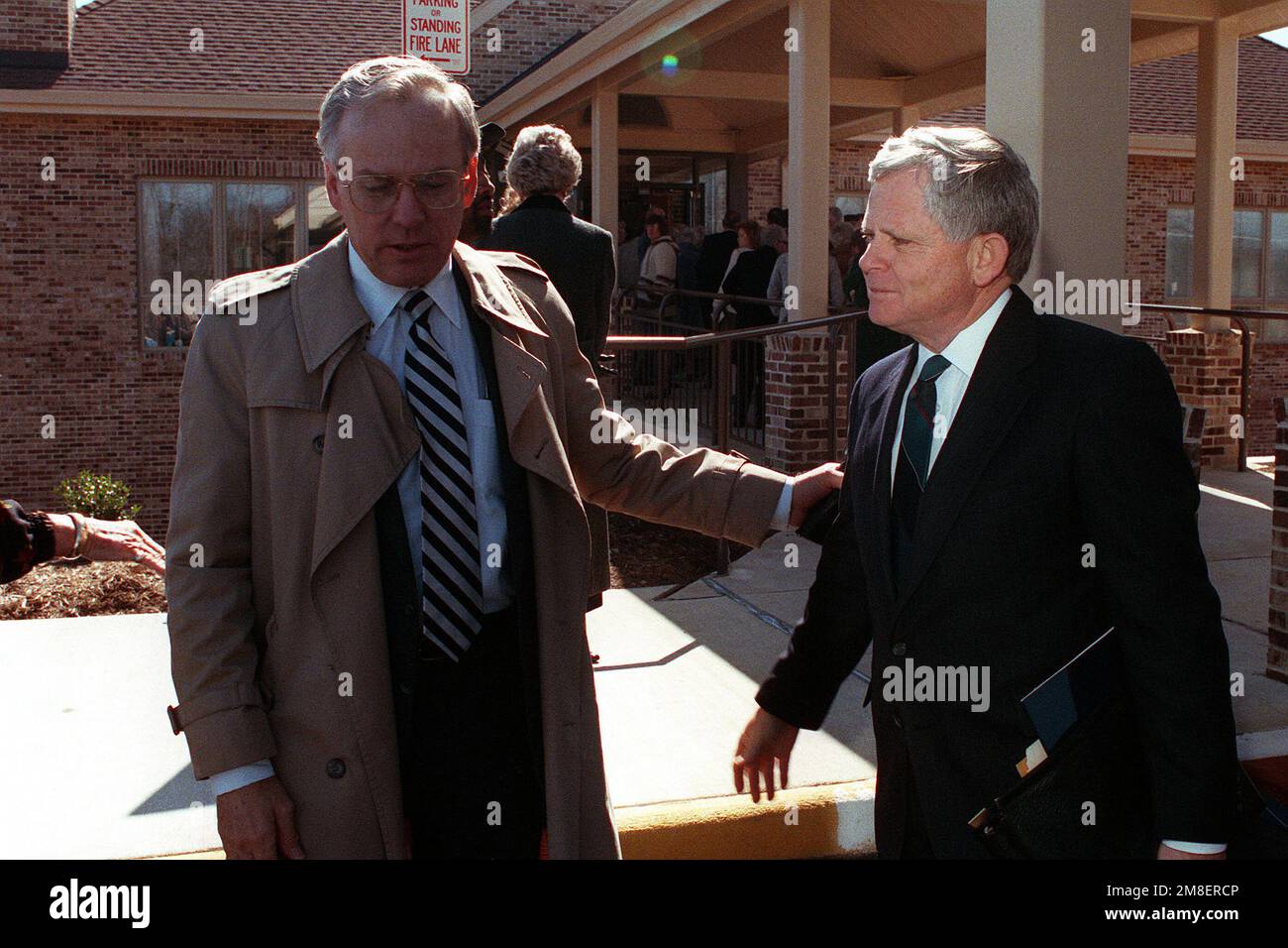 Secretary of the Navy H. Lawrence Garrett III, left, talks with an ...