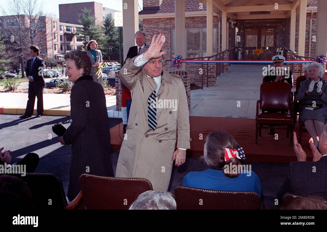 Secretary of the Navy H. Lawrence Garrett III and his wife stand to ...