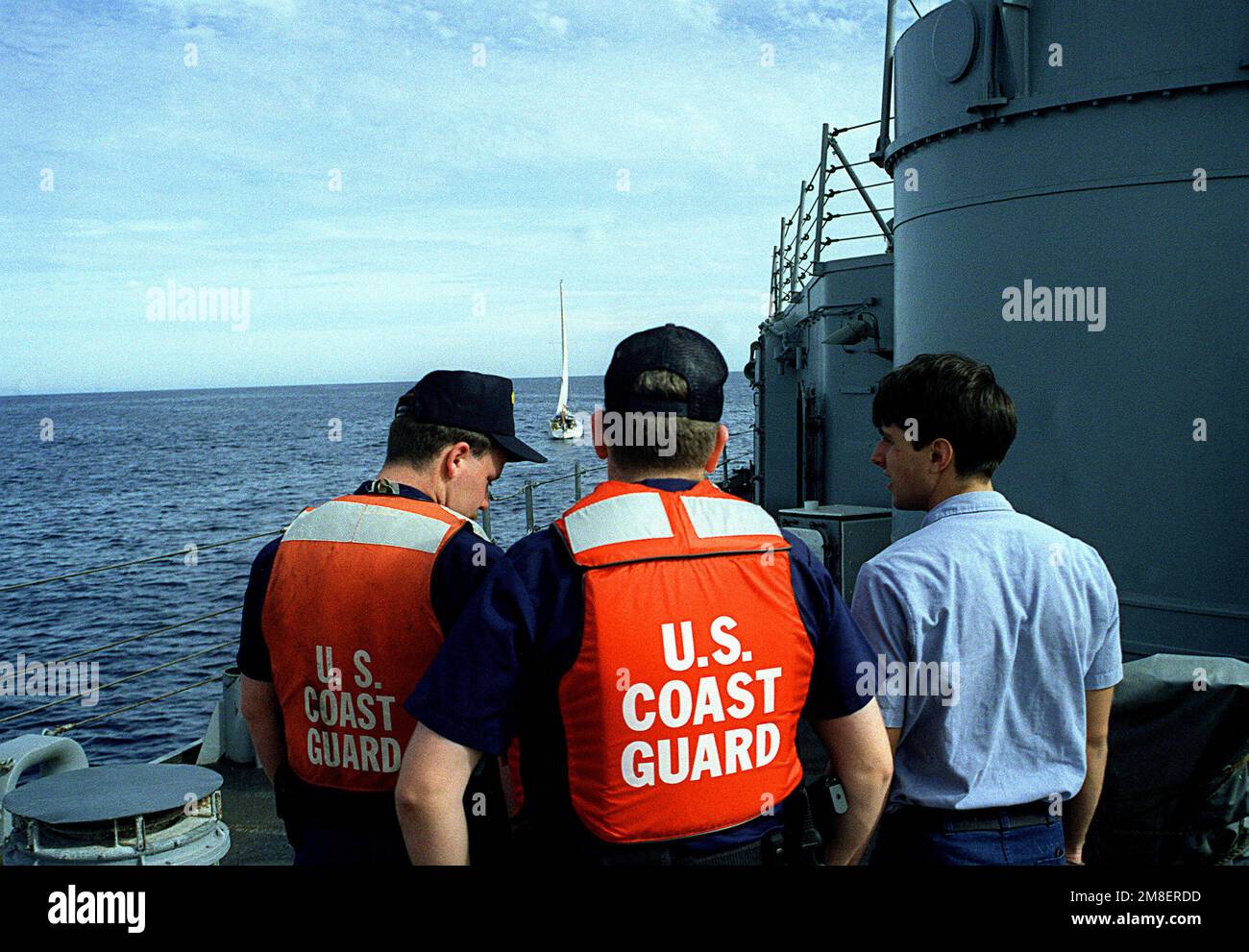 A sailor aboard the guided missile destroyer USS GOLDSBOROUGH (DDG-20 ...