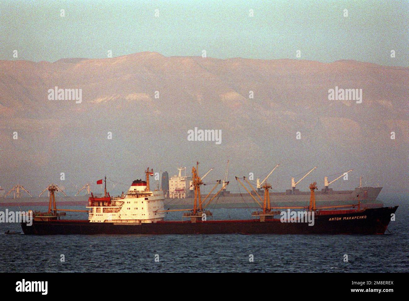 The Soviet dry cargo ship Anton Makarenko, foreground, lies at anchor ...