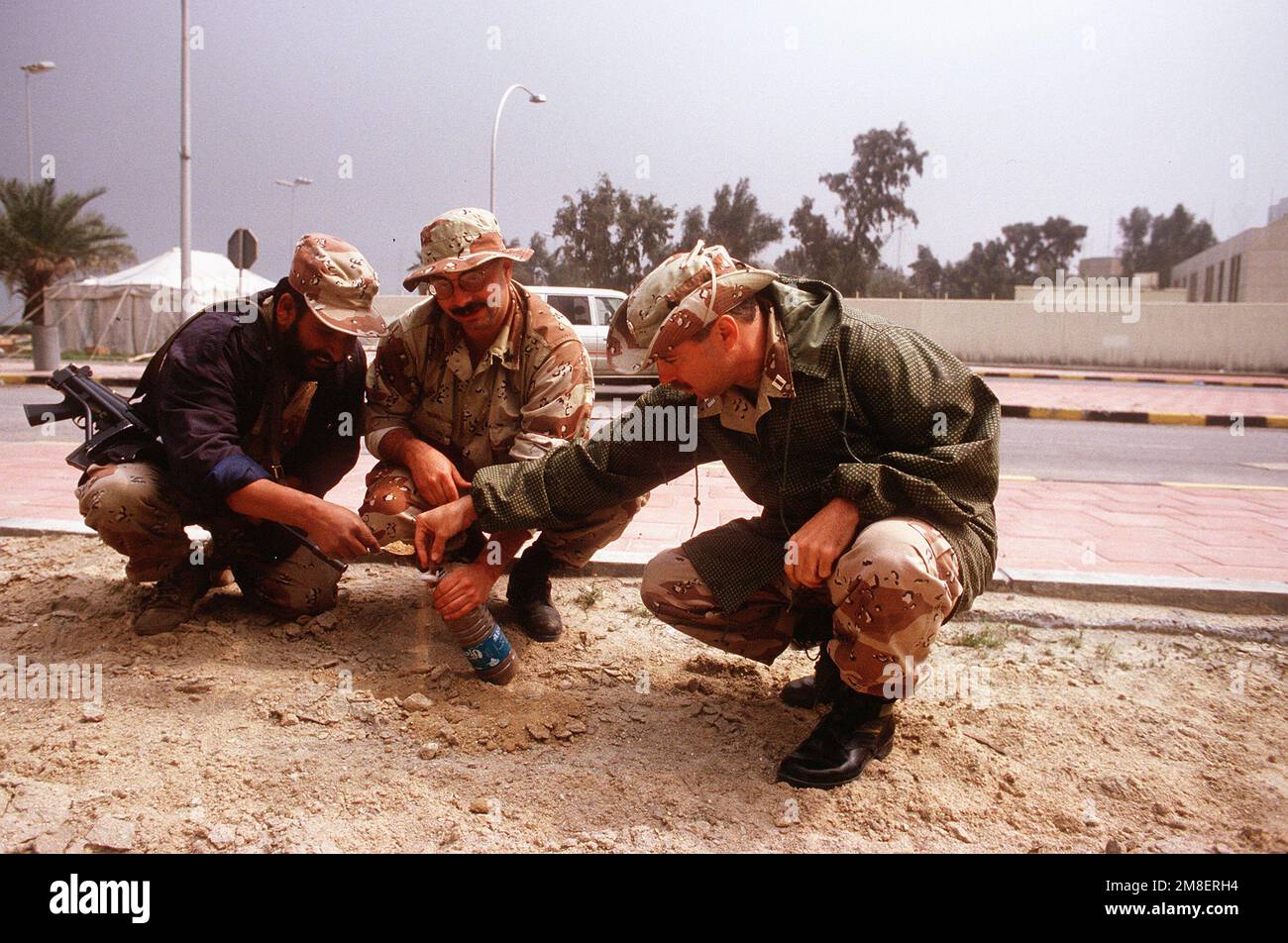 A Kuwaiti soldier, Journalist 1ST class Le Bosco, and LT. David Culler ...