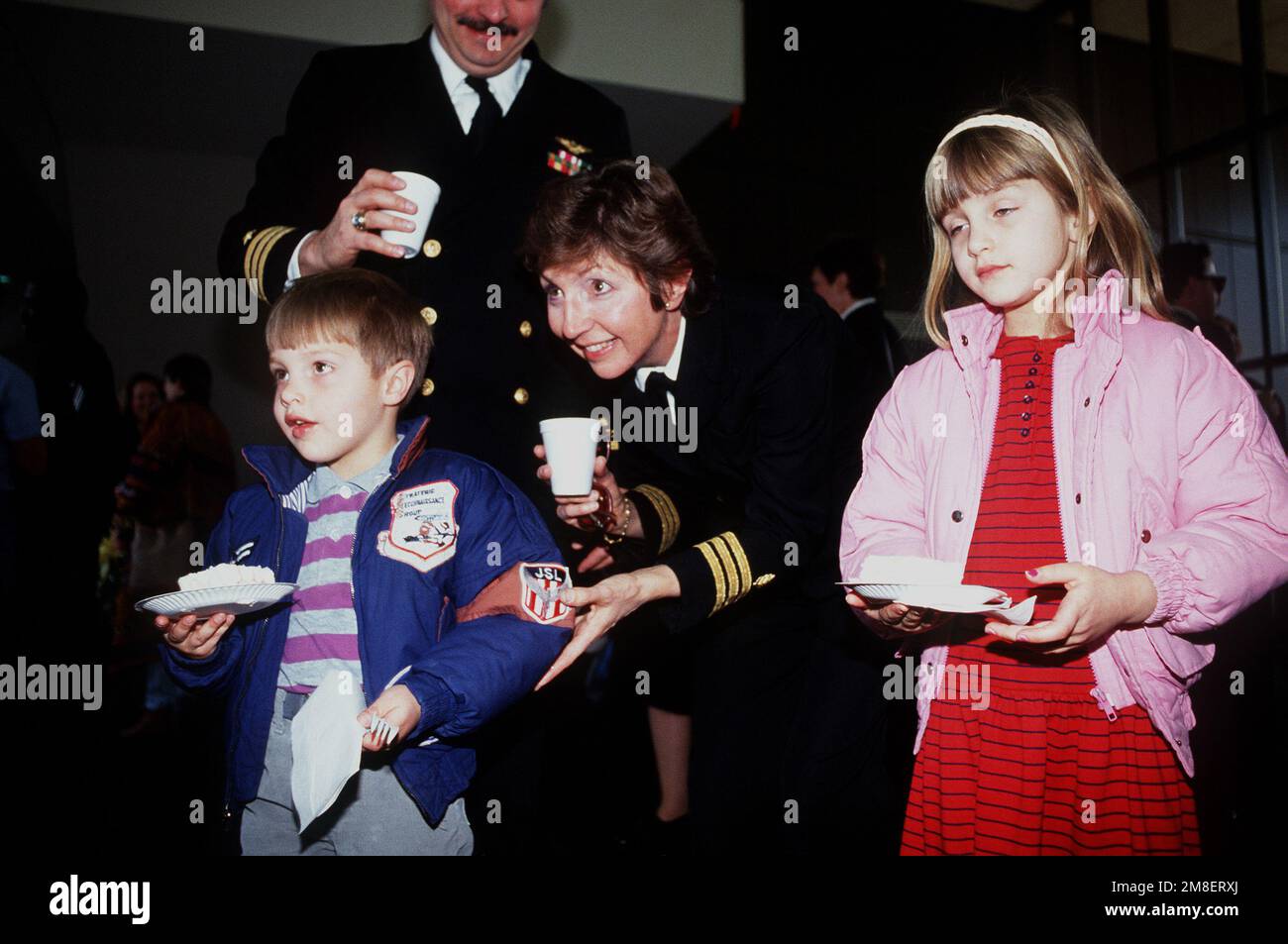 Cmdrs. Mike and Marilyn Wahl enjoy a homecoming party at the Bethesda ...