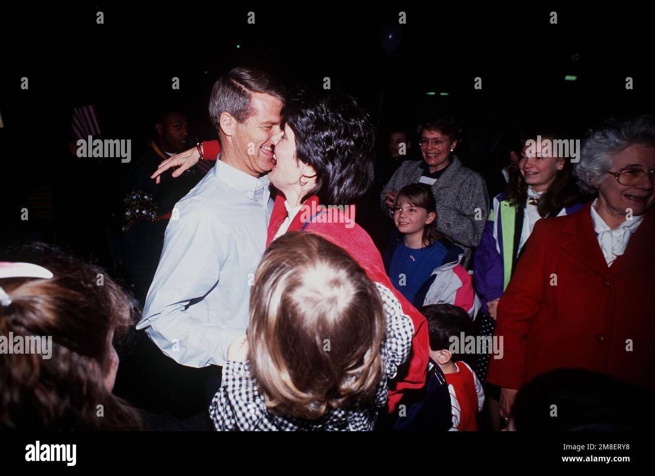 CMDR. Michael Vincent is reunited with his wife, Mary, at a homecoming ...