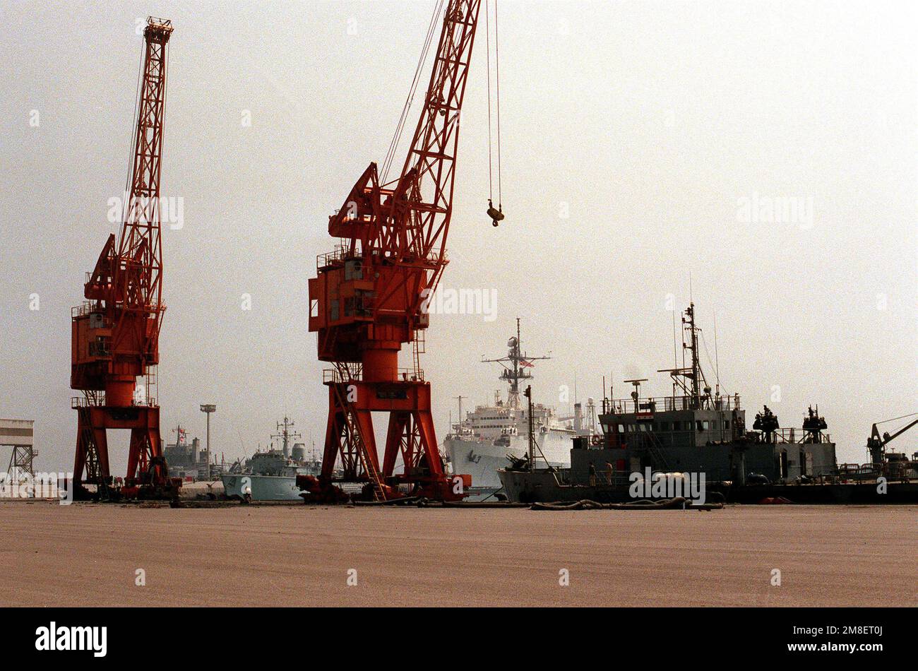 A captured Iraqi vessel, right, lies tied up at the dock after the re ...