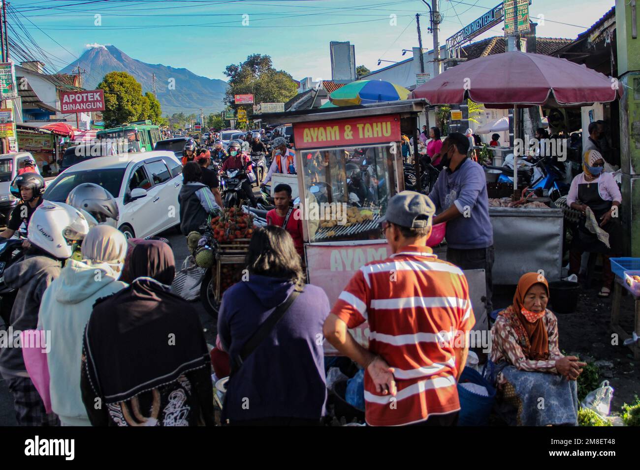 Sleman, Yogyakarta, Indonesia. 14th Jan, 2023. Residents can be seen ...