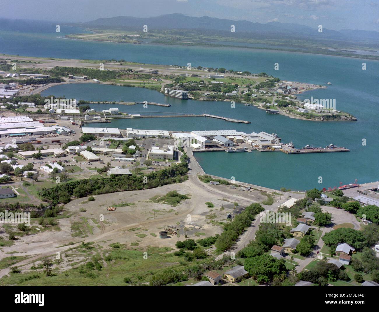 An aerial view of a portion of the naval station. Exact Date Shot ...