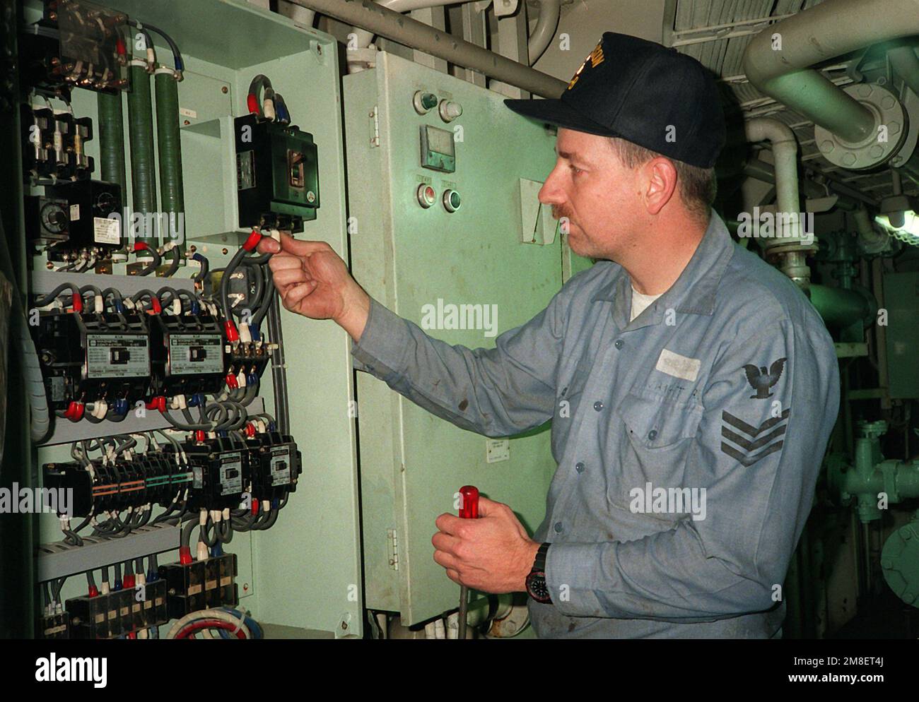 Electrician's Mate 1ST Class (SS) Reynold Wright, a crew member from ...