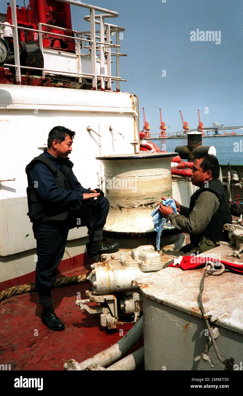 CHIEF Machinist's Mate Ceasar C. Bagsic, kneeling, and CHIEF Engineman ...