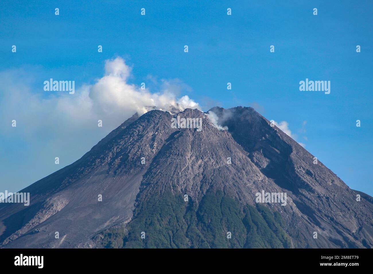 Sleman, Yogyakarta, Indonesia. 14th Jan, 2023. Mount Merapi emits thin ...